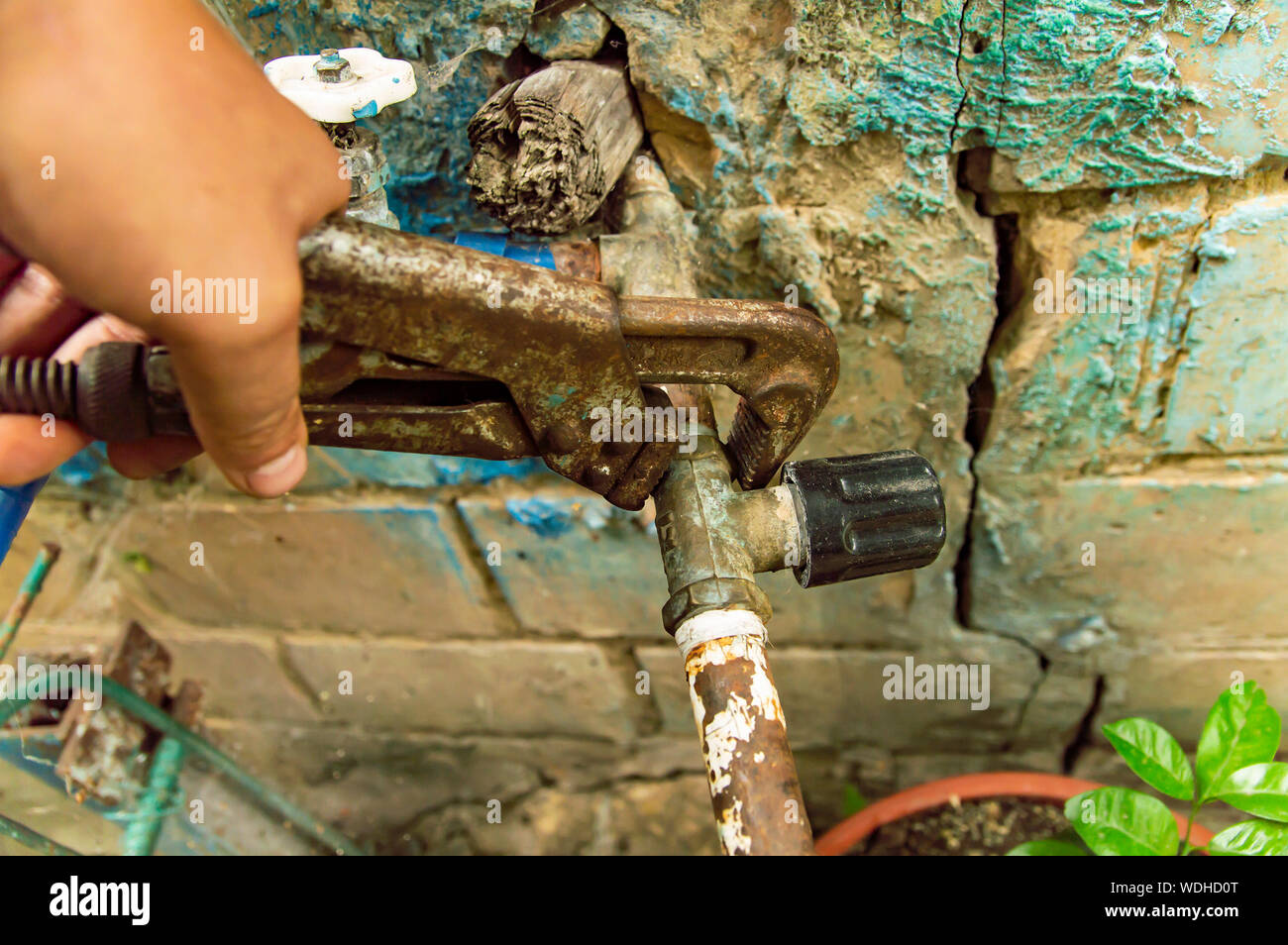 Wrench in the plumbing hand - repair of a water tap. Work tool Stock ...