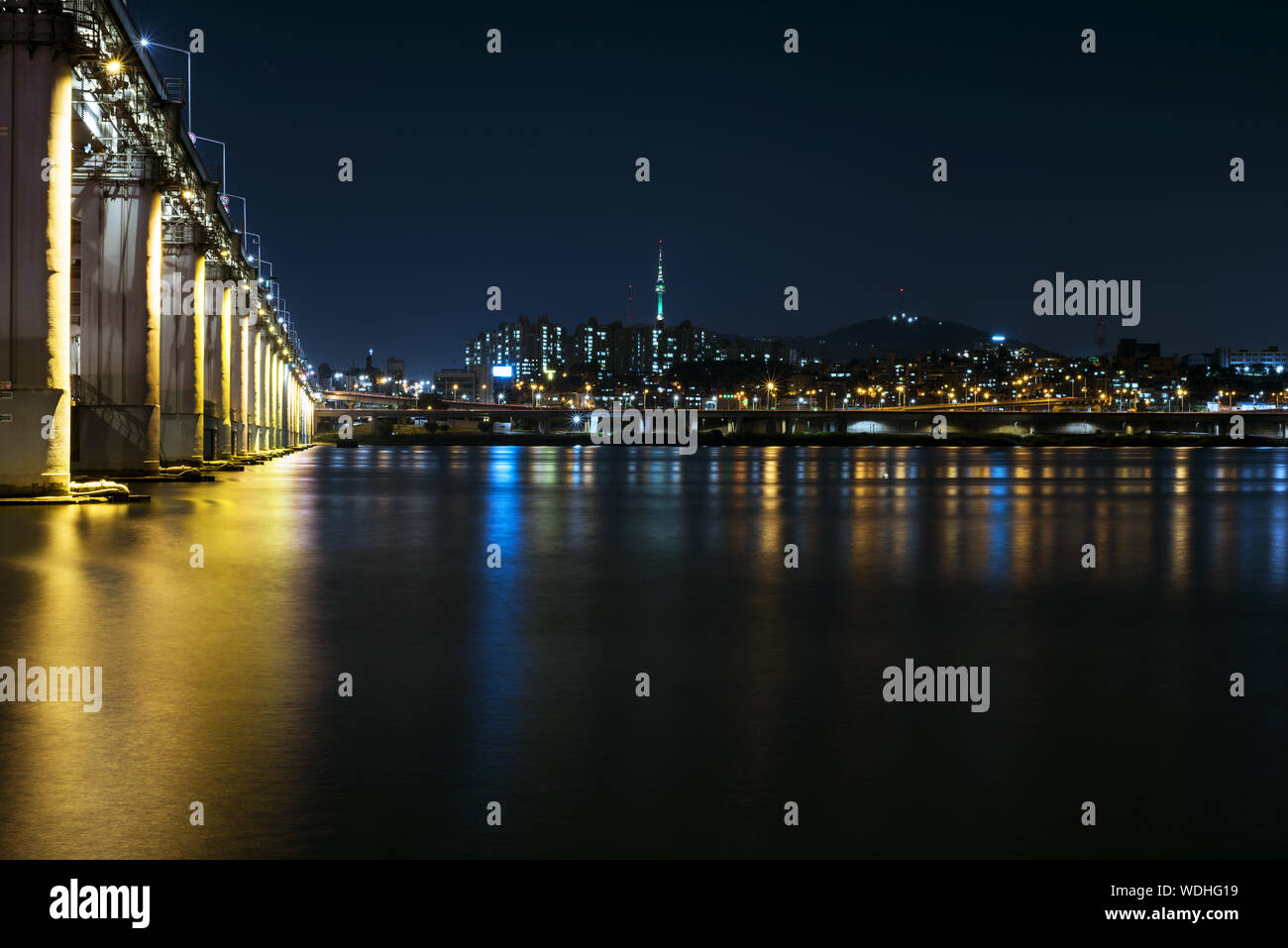 Bridge Over River At Night Stock Photo - Alamy