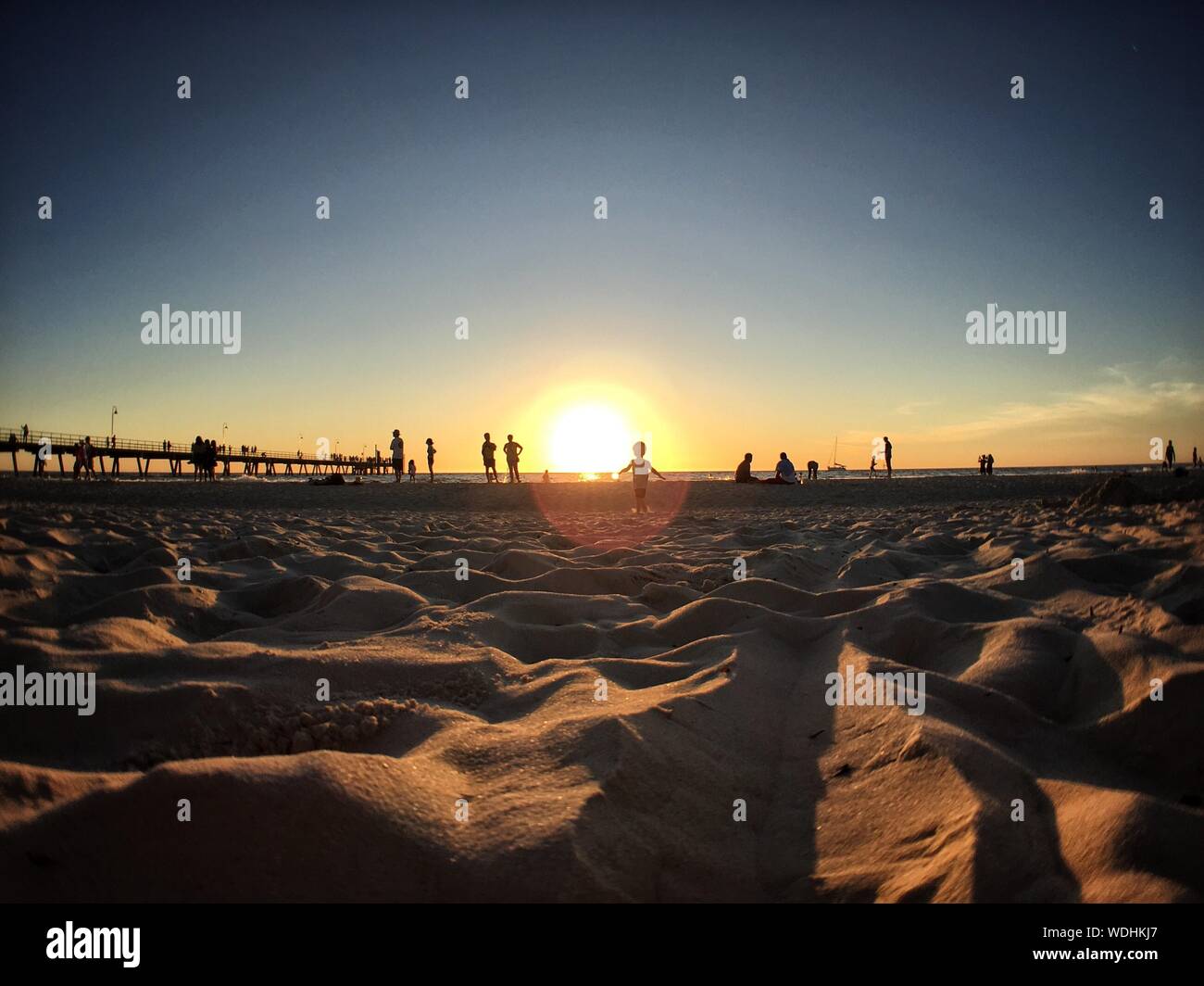 Boy at beach sunset hi-res stock photography and images - Alamy