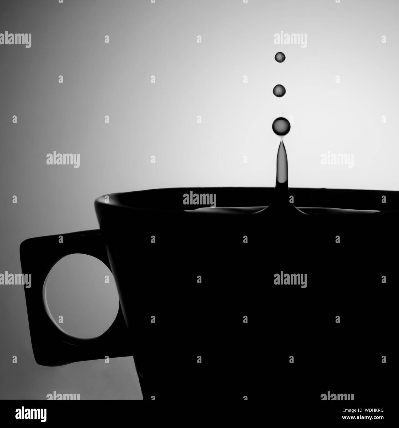 Cup falling hi-res stock photography and images - Alamy