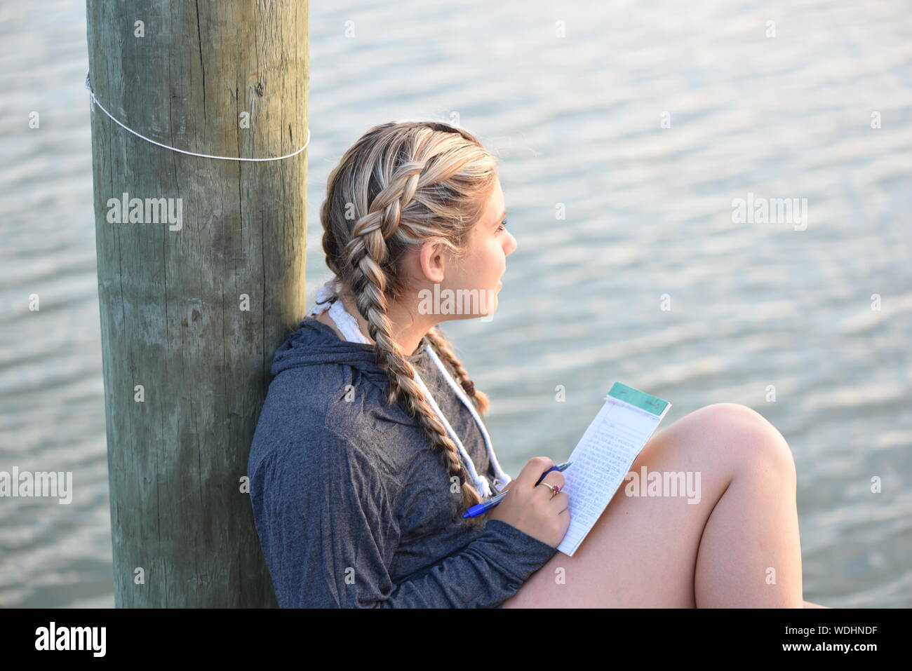Teenage girl writing on hi-res stock photography and images - Alamy