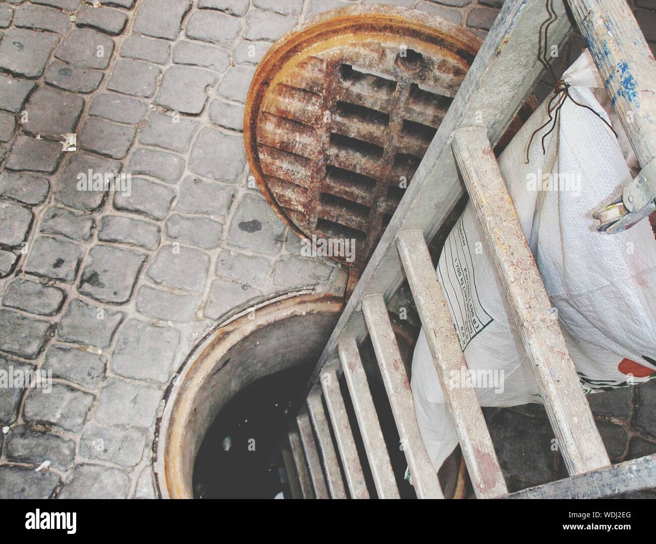Manhole in view hi-res stock photography and images - Alamy