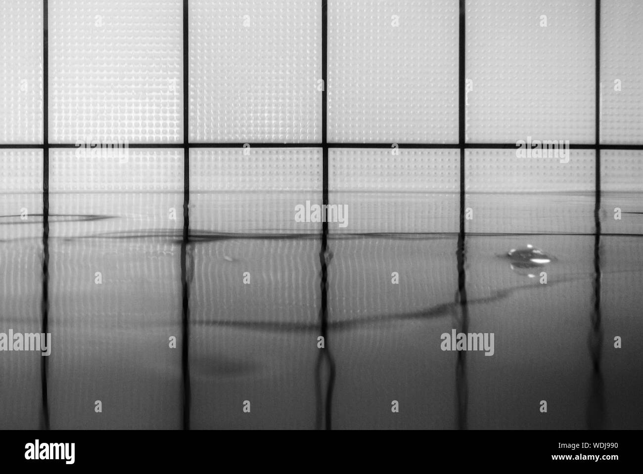 Reflection into the swimming pool Black and White Stock Photos & Images ...
