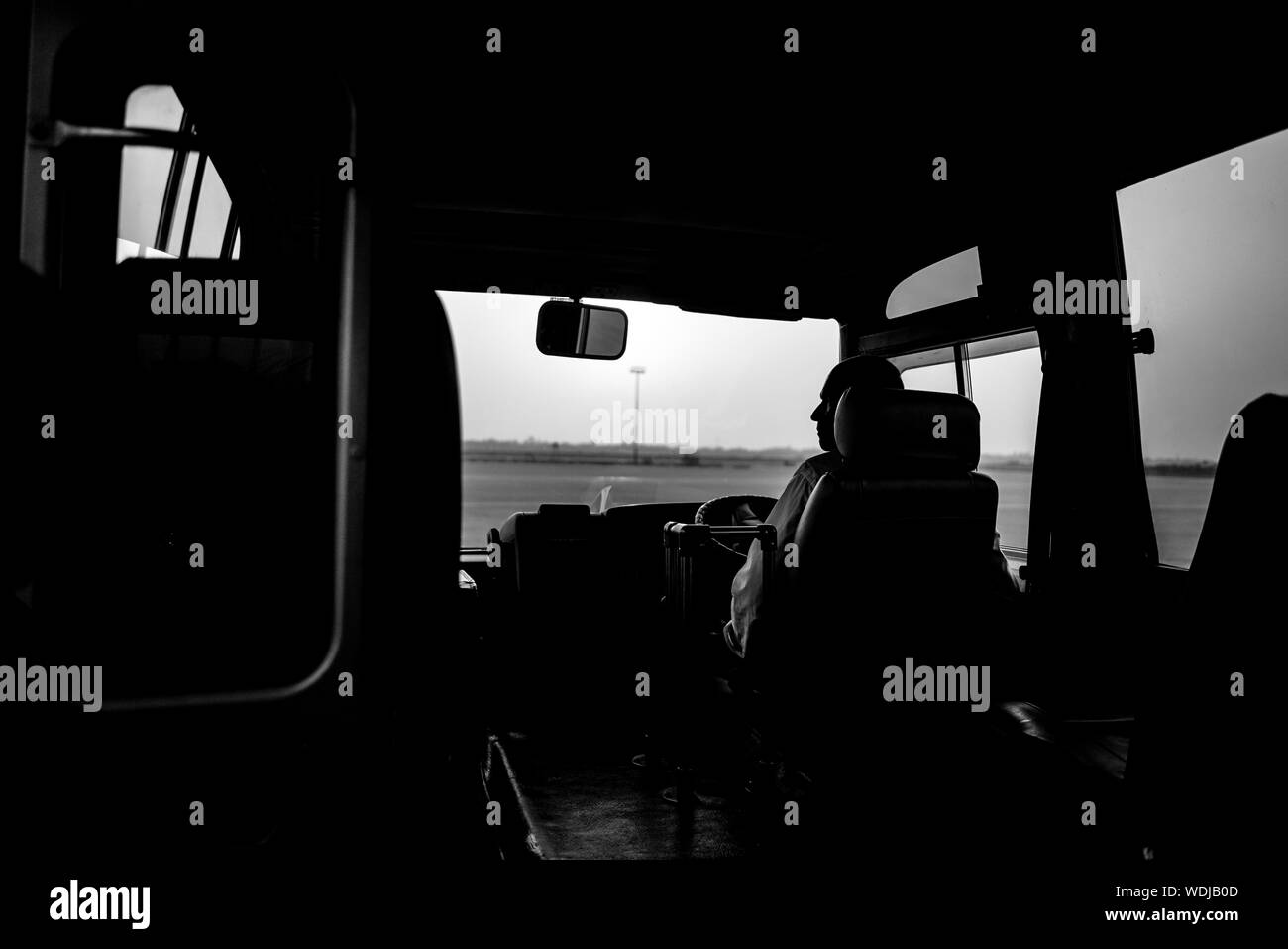 Bus interior driver seat Black and White Stock Photos & Images - Alamy