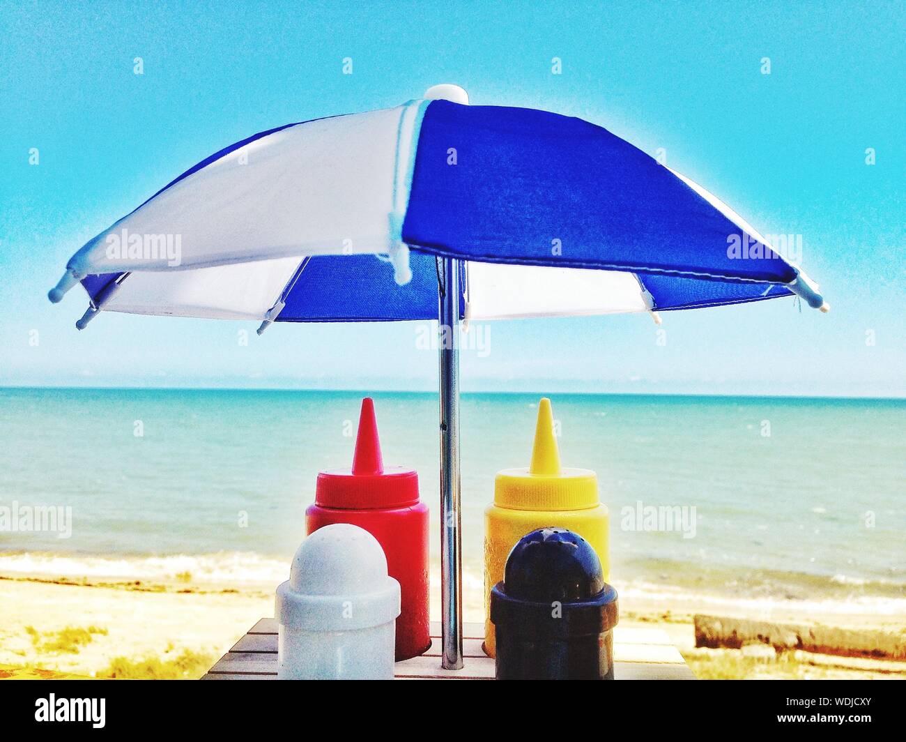Red white blue parasol beach hi-res stock photography and images - Alamy
