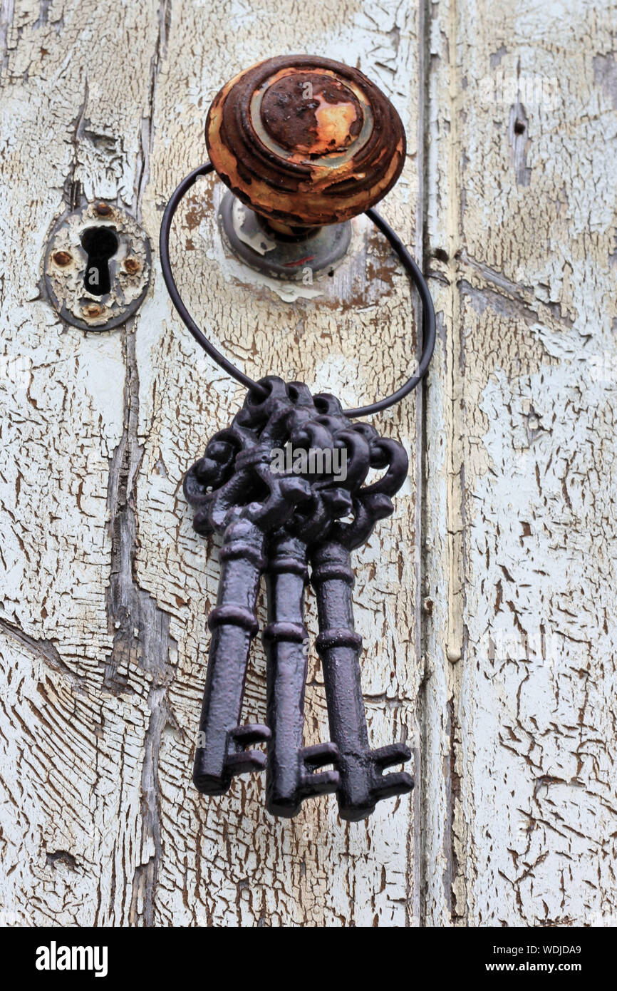 Old rusty key hanging on hi-res stock photography and images - Alamy