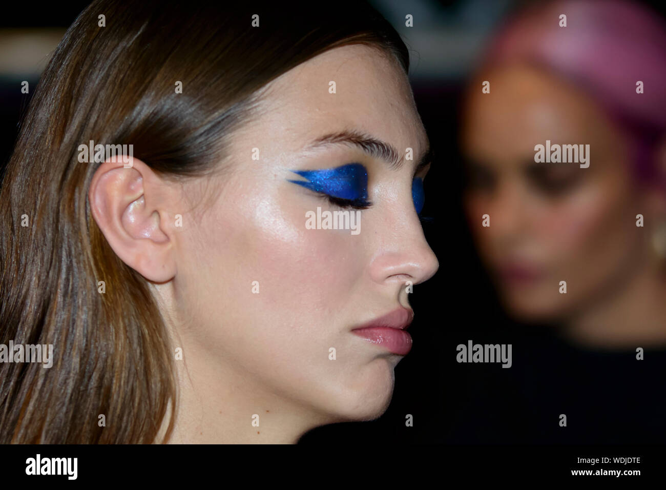 Model portrait backstage before the catwalk. The Spanish fashion ...