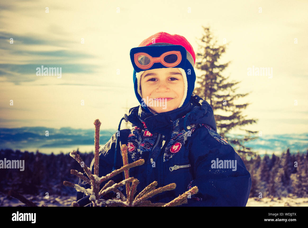 Boy in a snow hi-res stock photography and images - Alamy