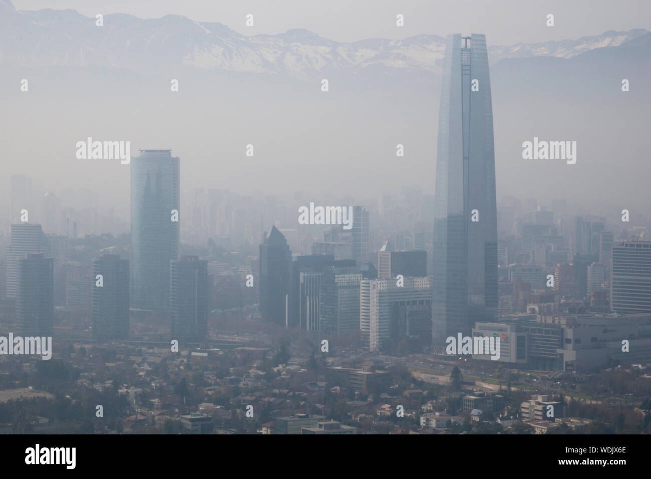 High levels of air pollution obscure the Costanera Center and other ...