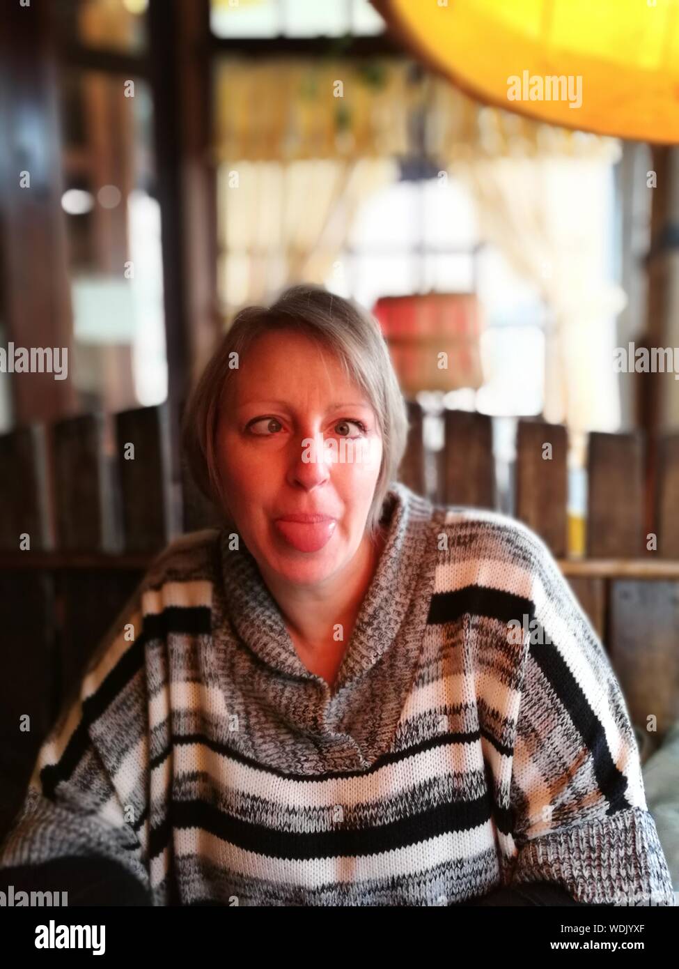 Woman making funny face hi-res stock photography and images - Alamy