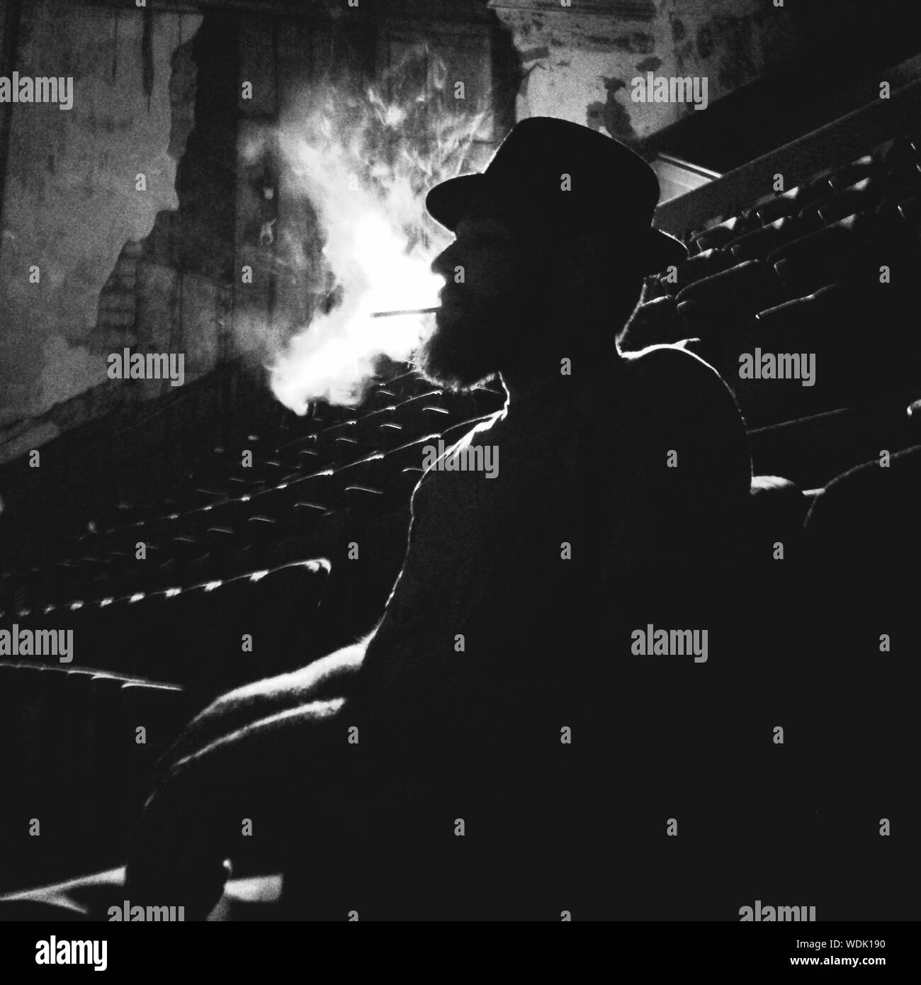 Man smoking cigarette dark hi-res stock photography and images - Alamy