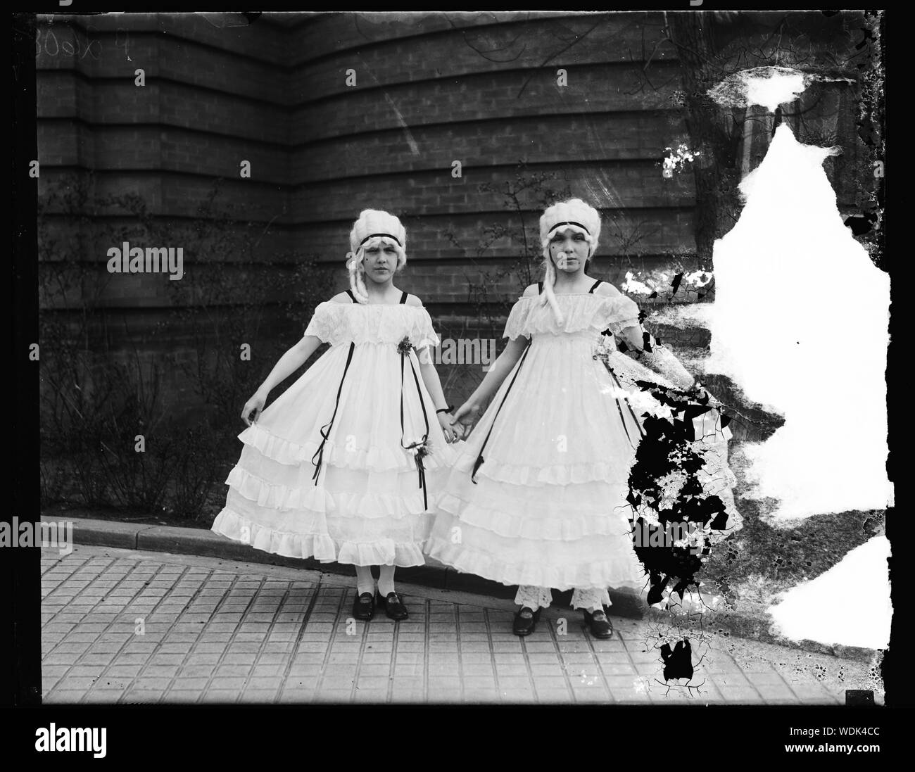 Girls dressed in costumes Black and White Stock Photos & Images - Alamy
