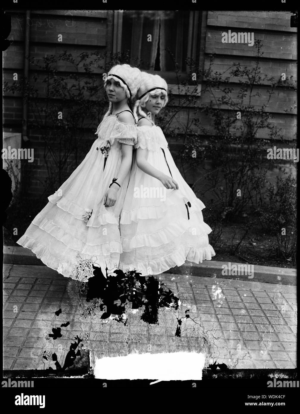 Girls dressed in costumes Black and White Stock Photos & Images - Alamy