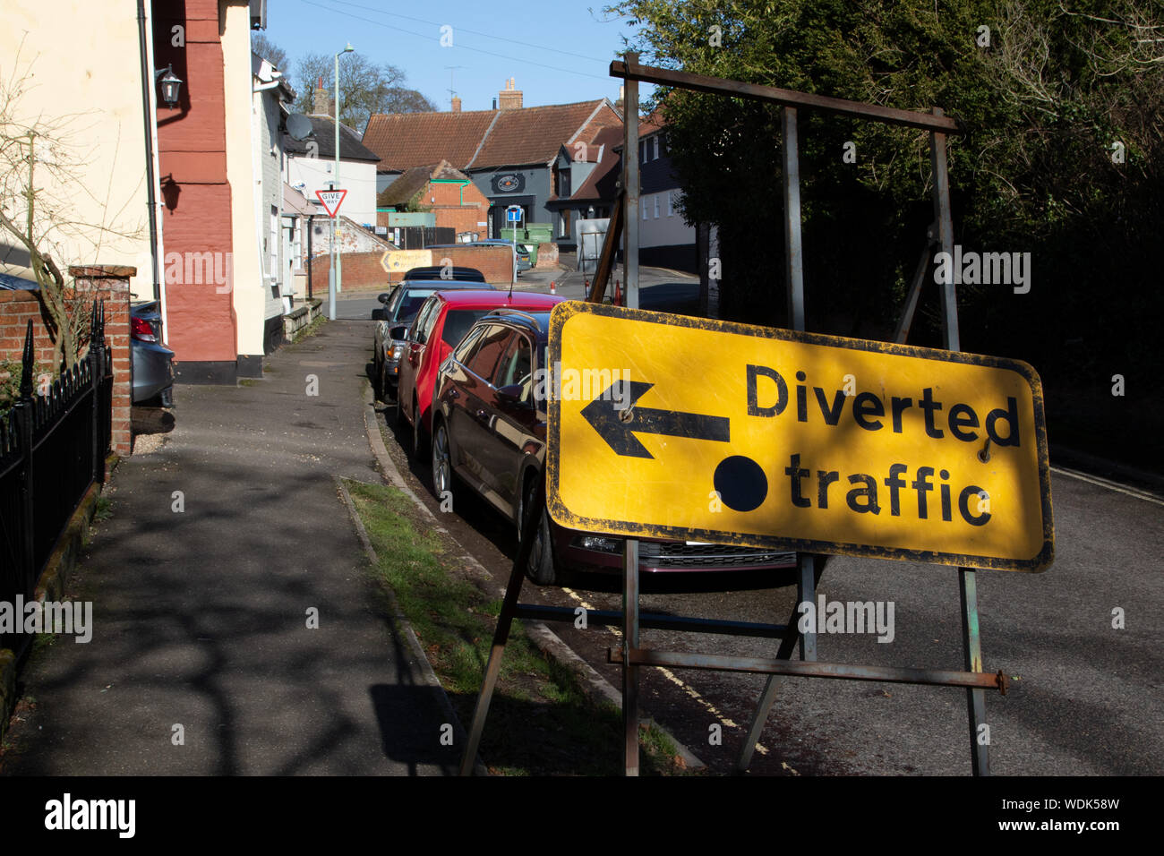Annoying road sign encroaching on the pavement/sidewalk Stock Photo - Alamy