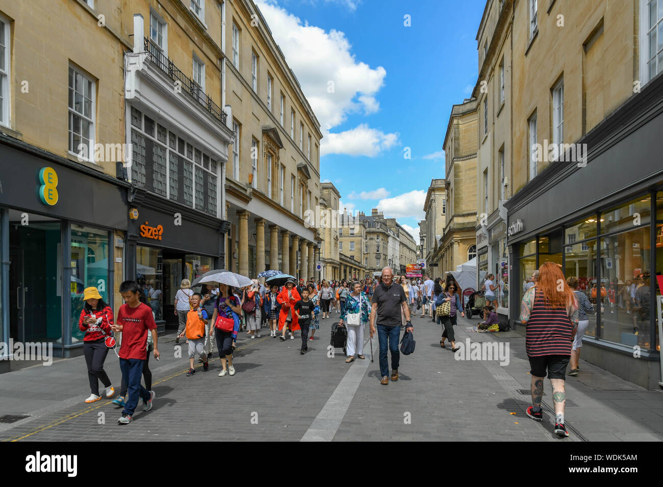 BATH, ENGLAND - JULY 2019: People walking through the shopping centre ...