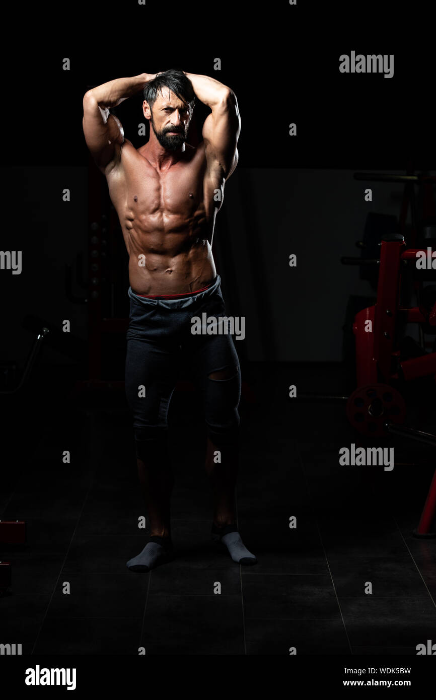 Portrait Of A Adult Physically Fit Man Showing His Well Trained Body ...