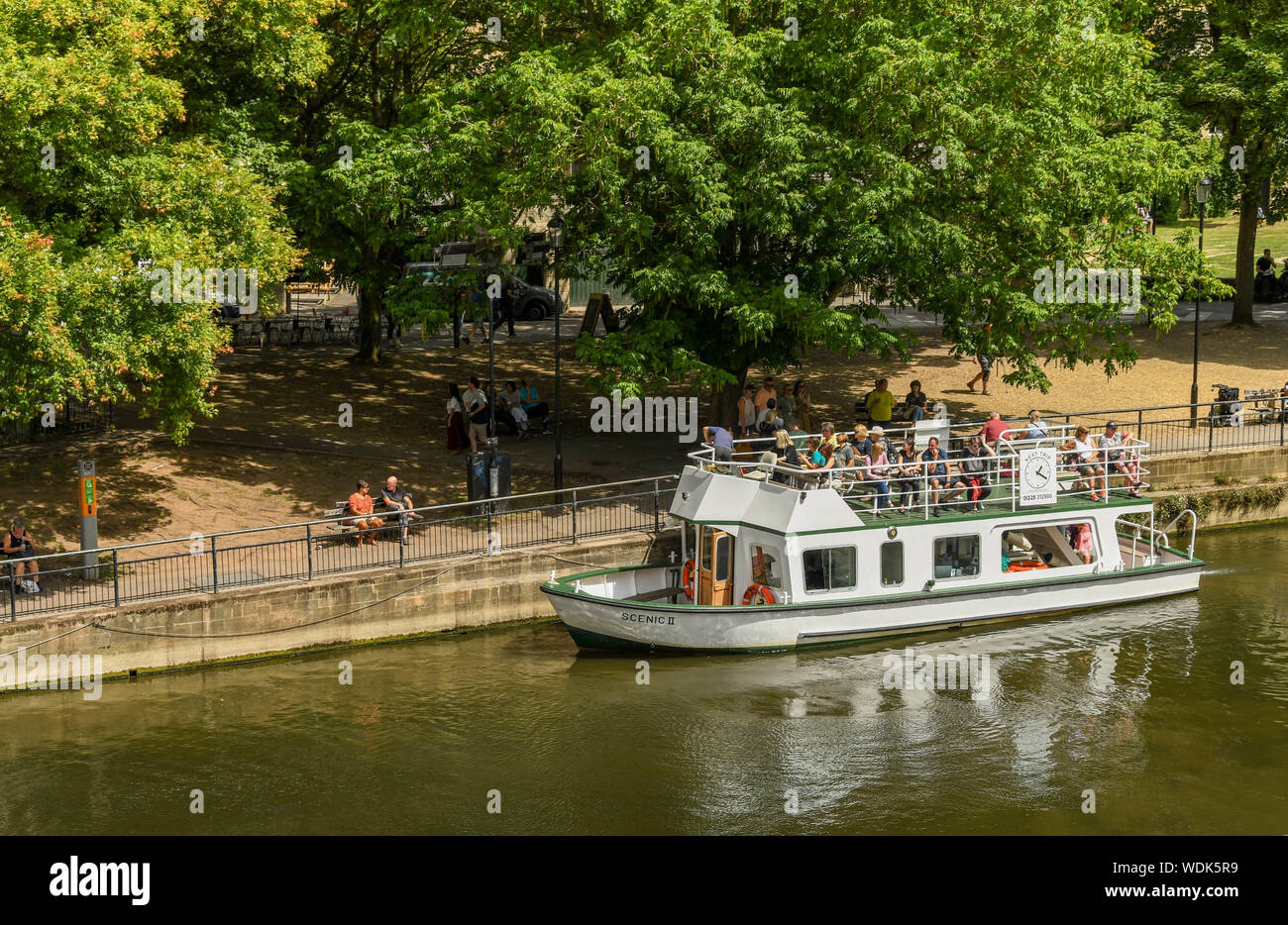 BATH, ENGLAND - JULY 2019: Tourist river cruise boat on the River Avon ...