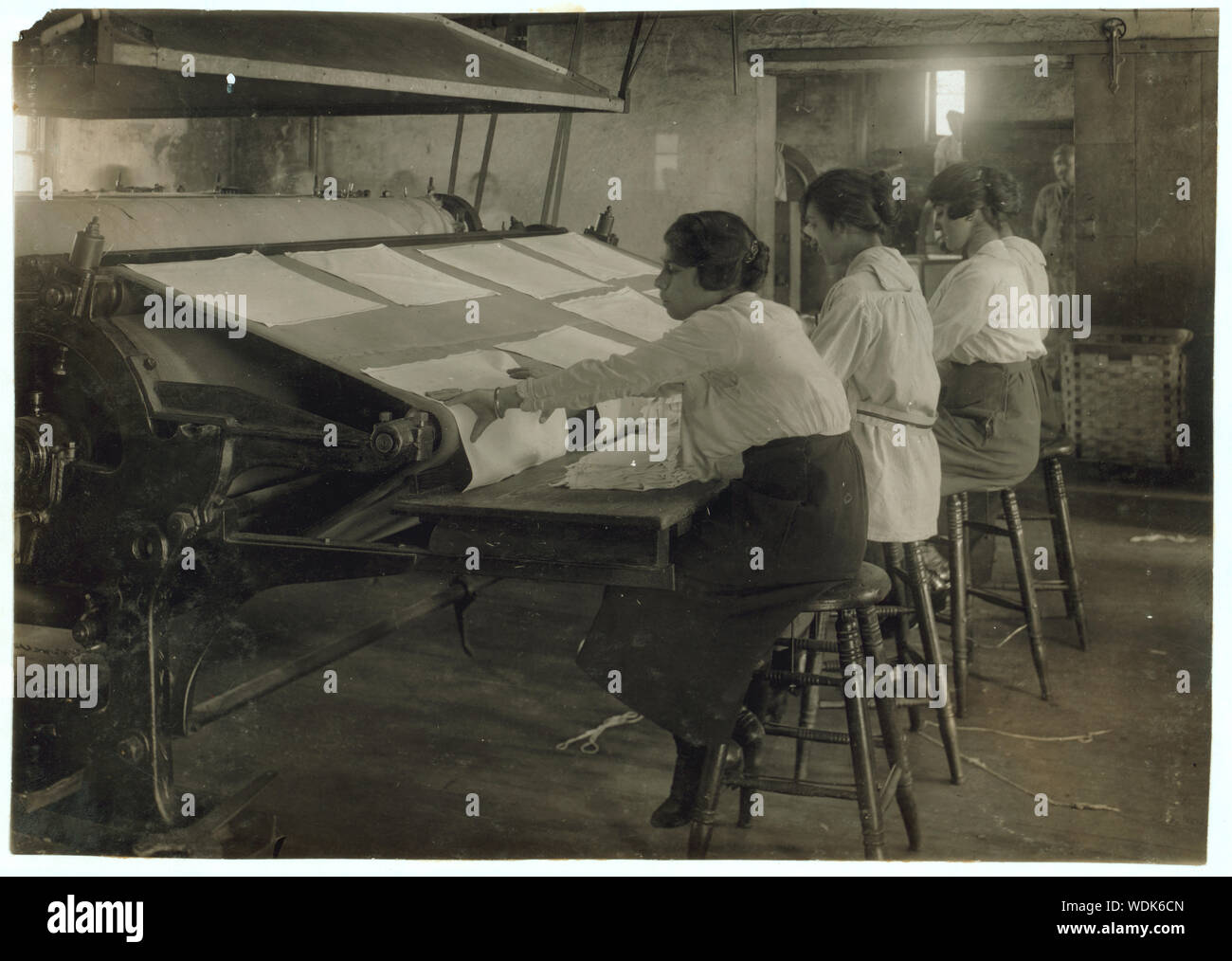 Girls working at mangle in Bonanno Laundry, 12 Foster Wharf. All are 15 ...