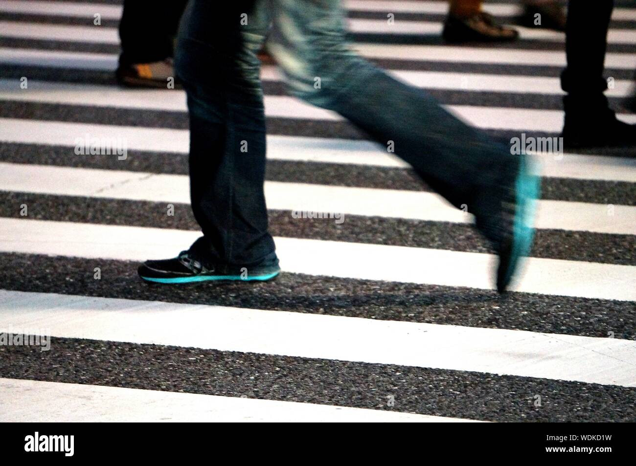 Walking on pedestrian crossing hi-res stock photography and images - Alamy