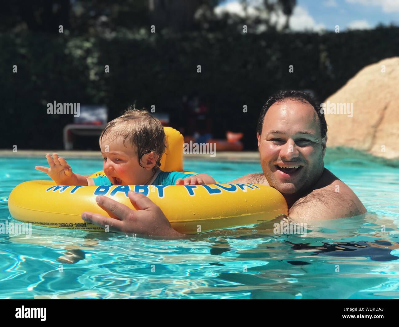 Father playing with baby in the water hi-res stock photography and ...