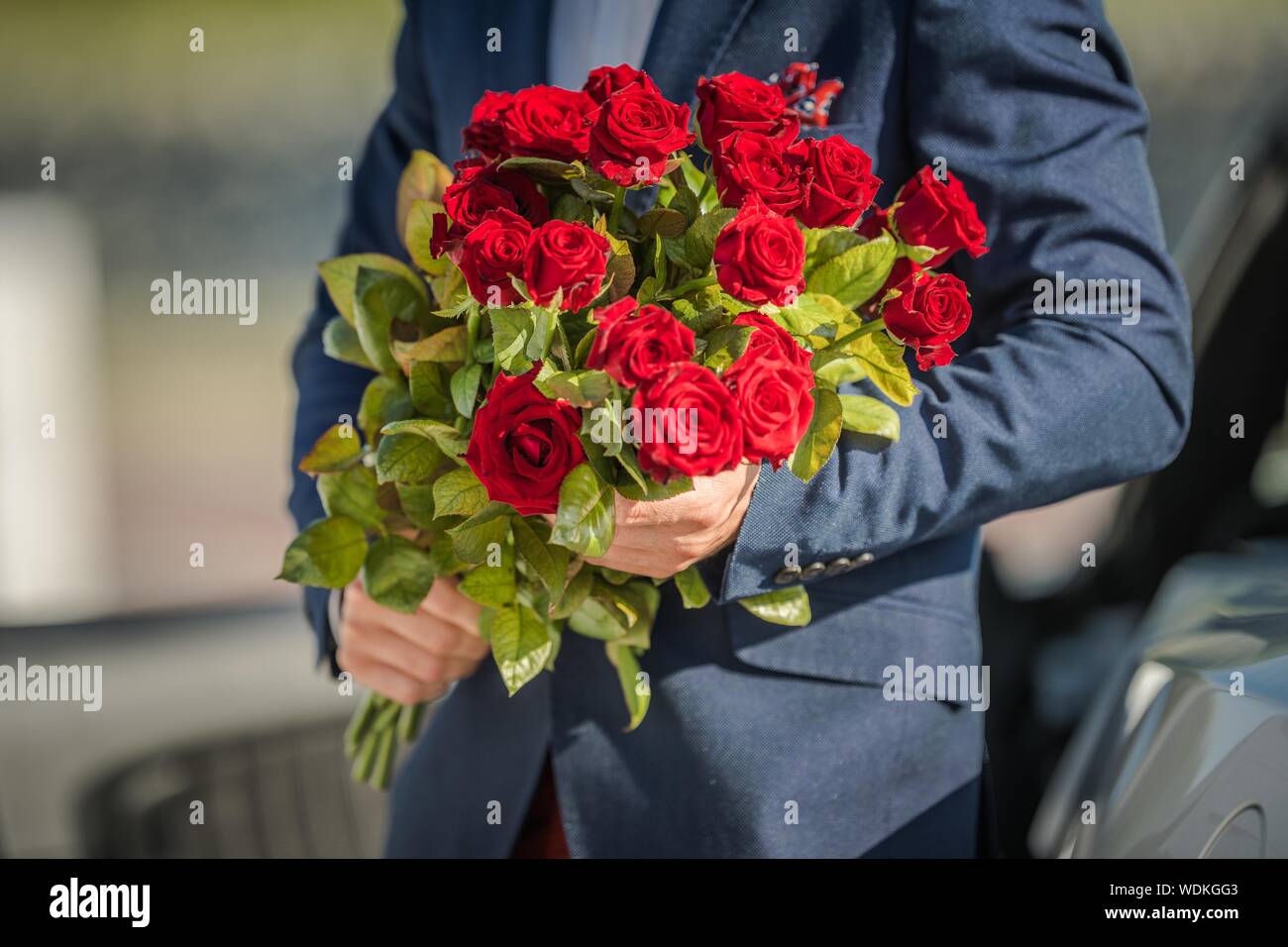 Men with flowers hi-res stock photography and images - Alamy