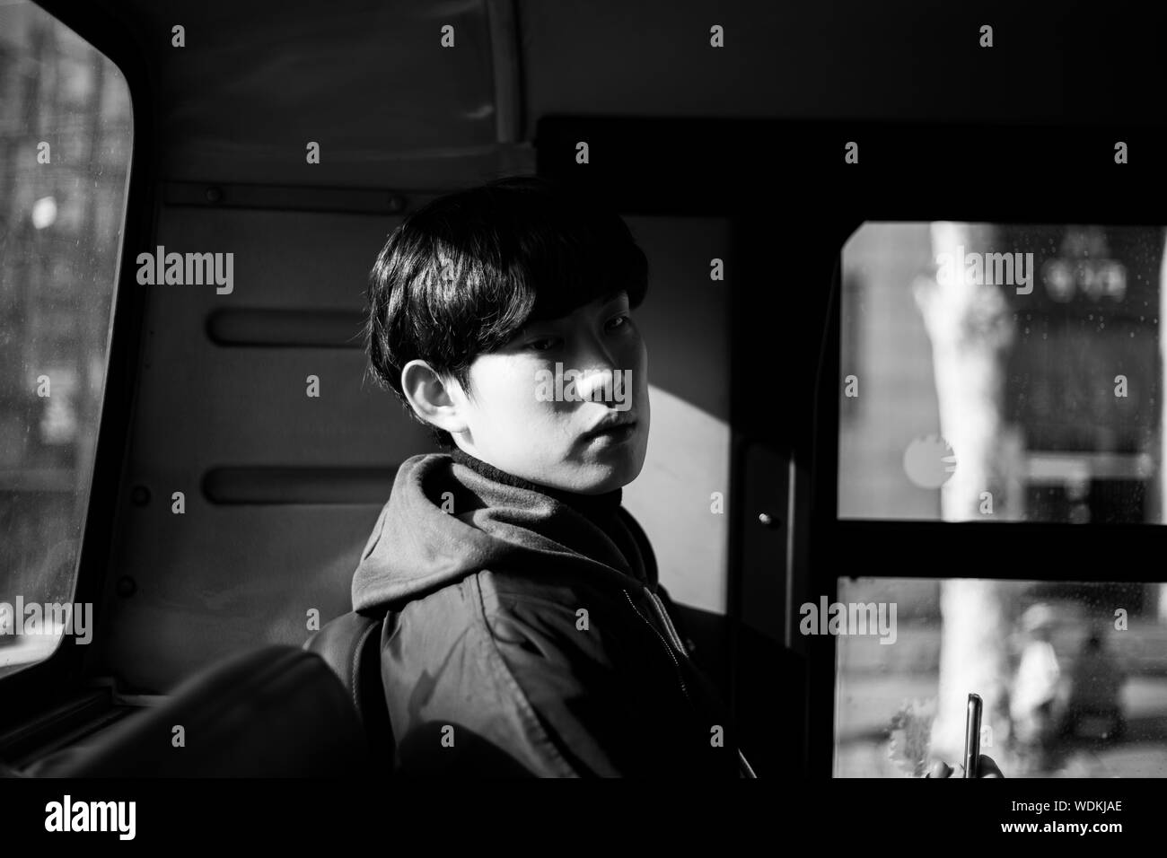 Man sitting on bus hi-res stock photography and images - Alamy