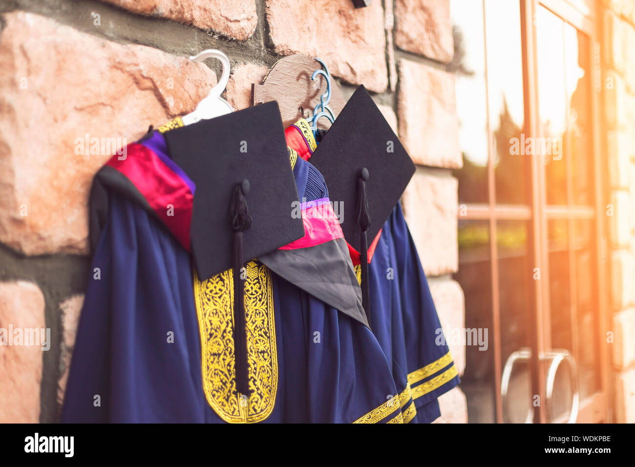 Graduation gowns hanging hi-res stock photography and images - Alamy
