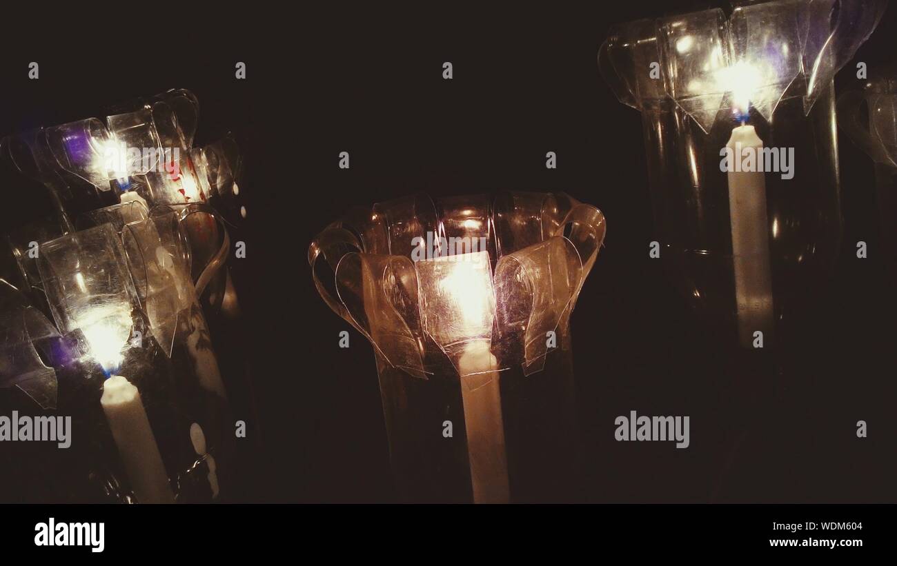 Lit candlestick hi-res stock photography and images - Alamy