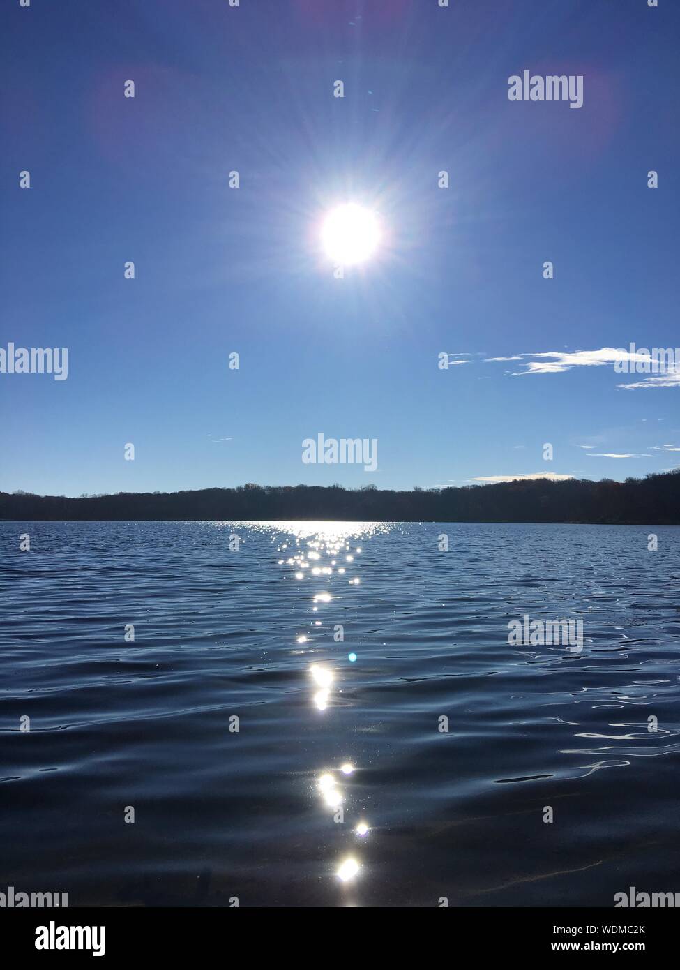 Sun shining over water lake hi-res stock photography and images - Alamy