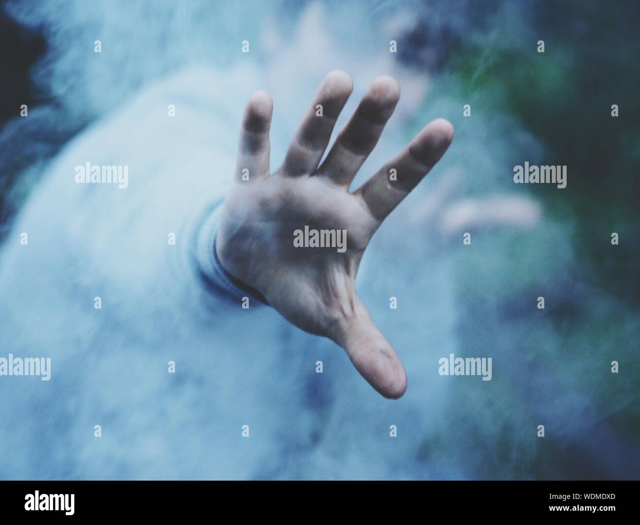Hand and smoke hi-res stock photography and images - Alamy