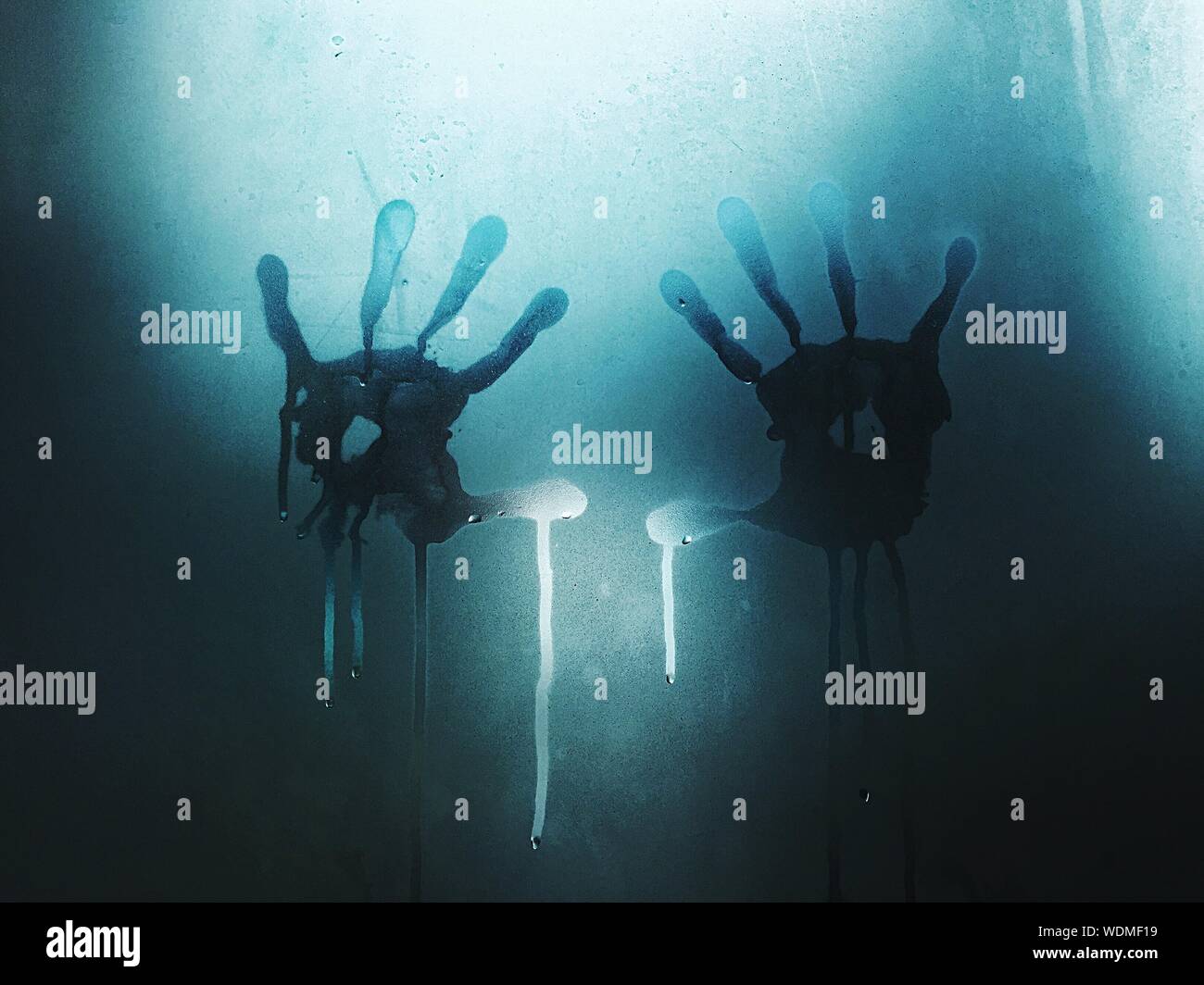 Handprints On Condensed Glass Window Stock Photo - Alamy