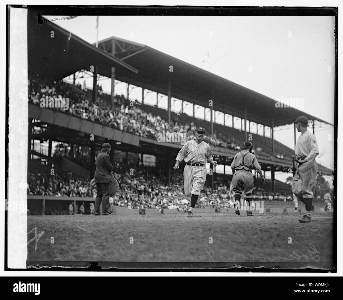 Run scoring Black and White Stock Photos & Images - Alamy