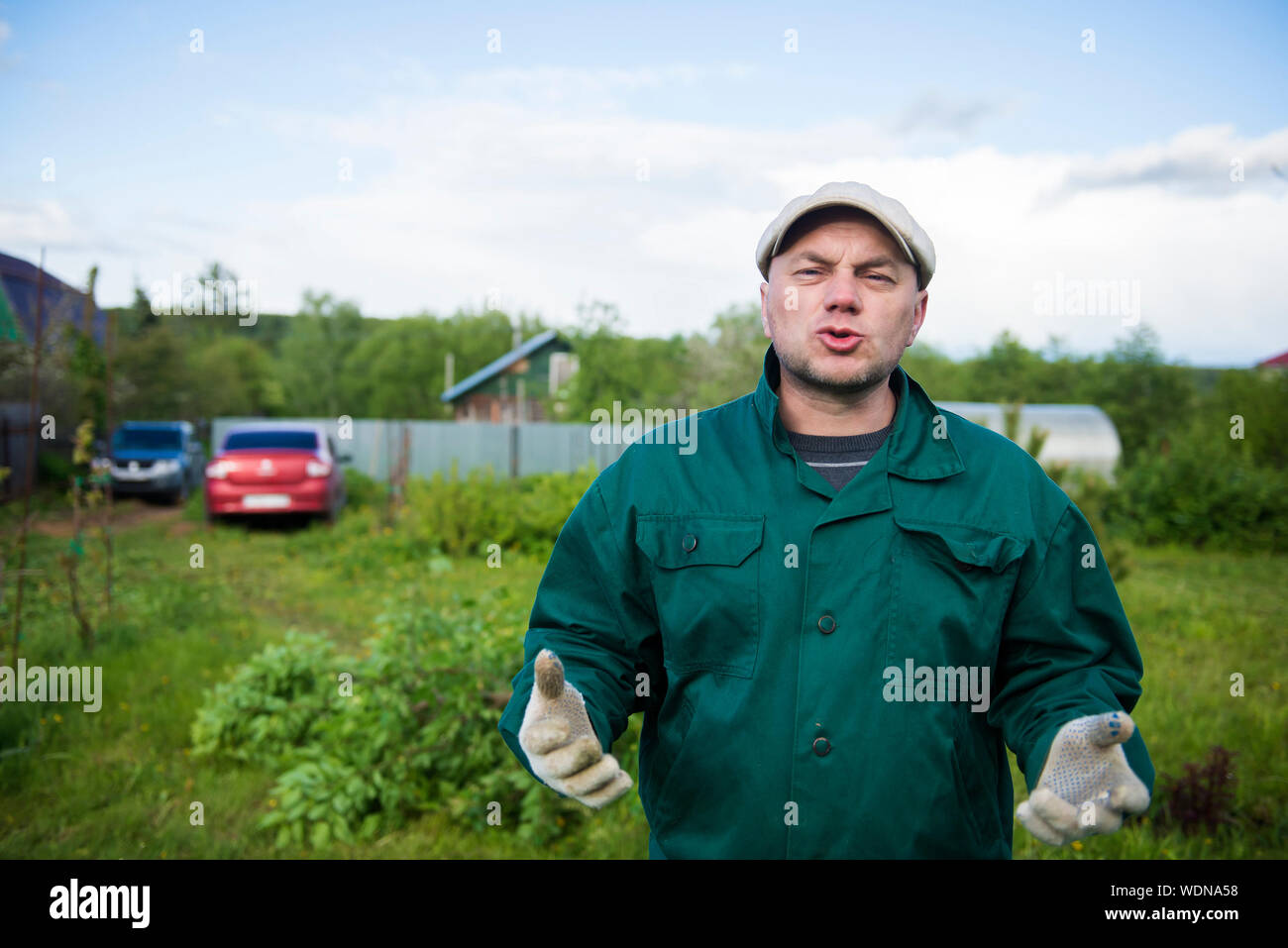 Man in front garden hi-res stock photography and images - Alamy