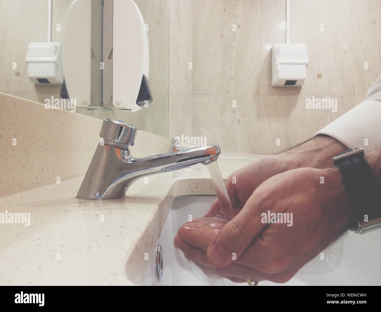 Washing hand under running water hi-res stock photography and images ...