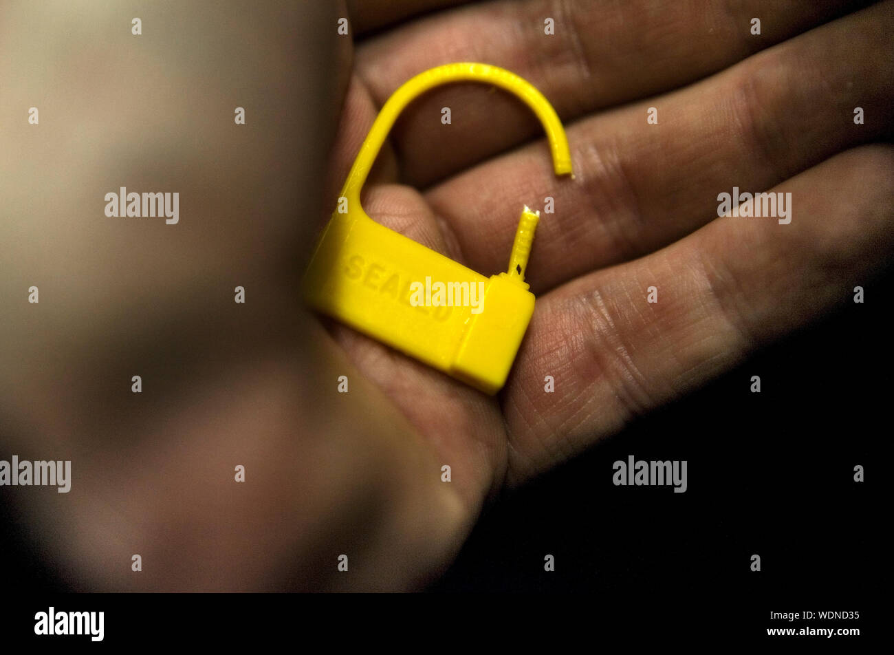 Hand and lock hi-res stock photography and images - Alamy