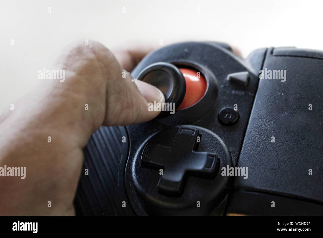 Hand game controller hi-res stock photography and images - Alamy