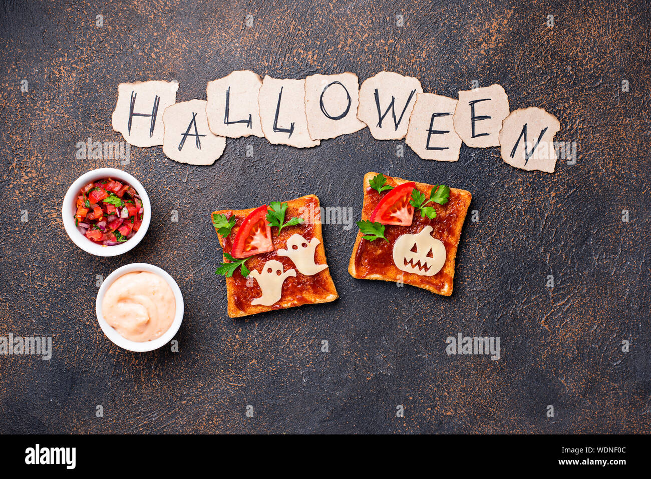 Halloween sandwiches toasts with ghost and pumpkin Stock Photo - Alamy