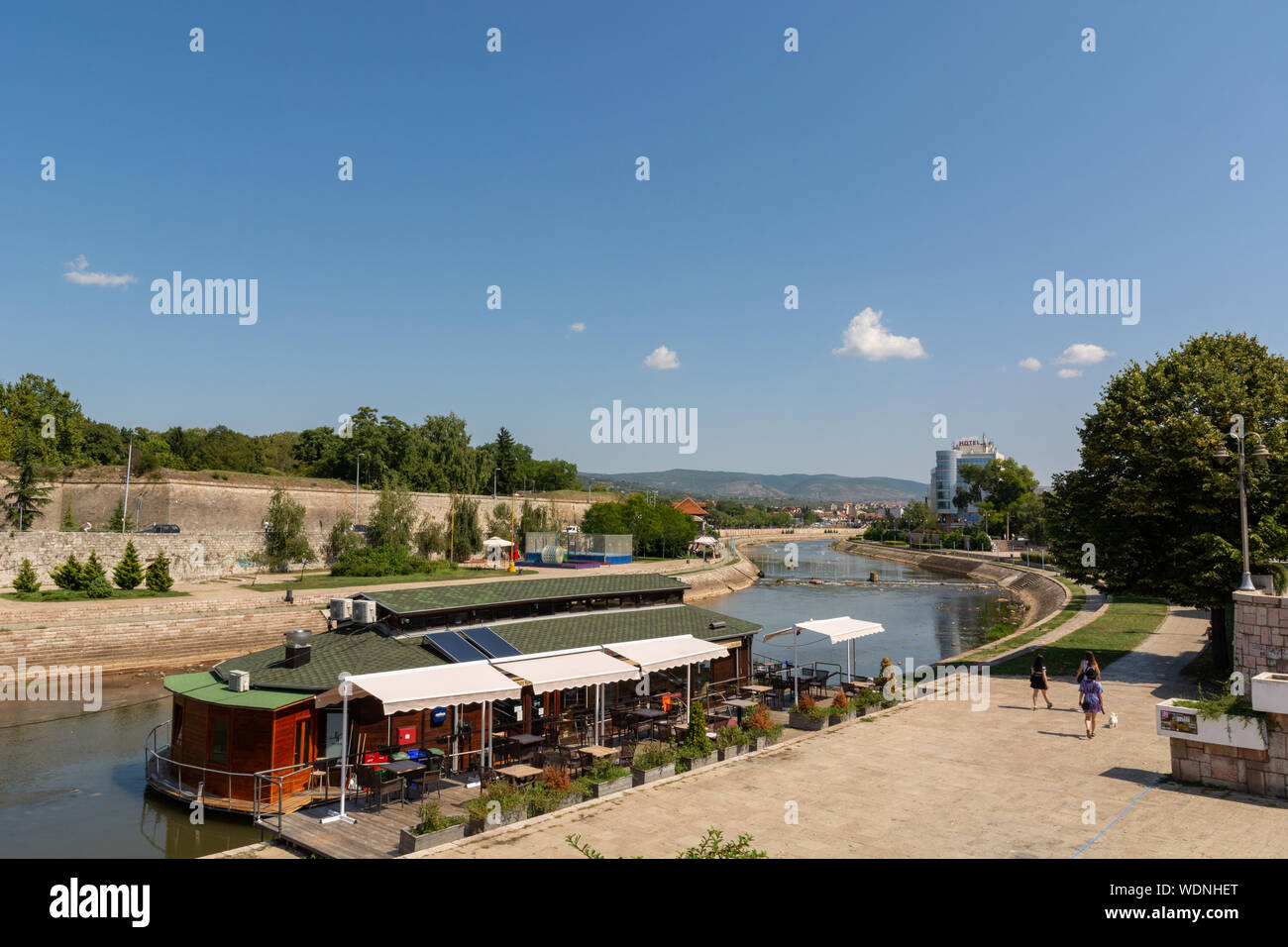 Nis, Serbia - August 28, 2019 Raft restaurant on river Nisava and a ...