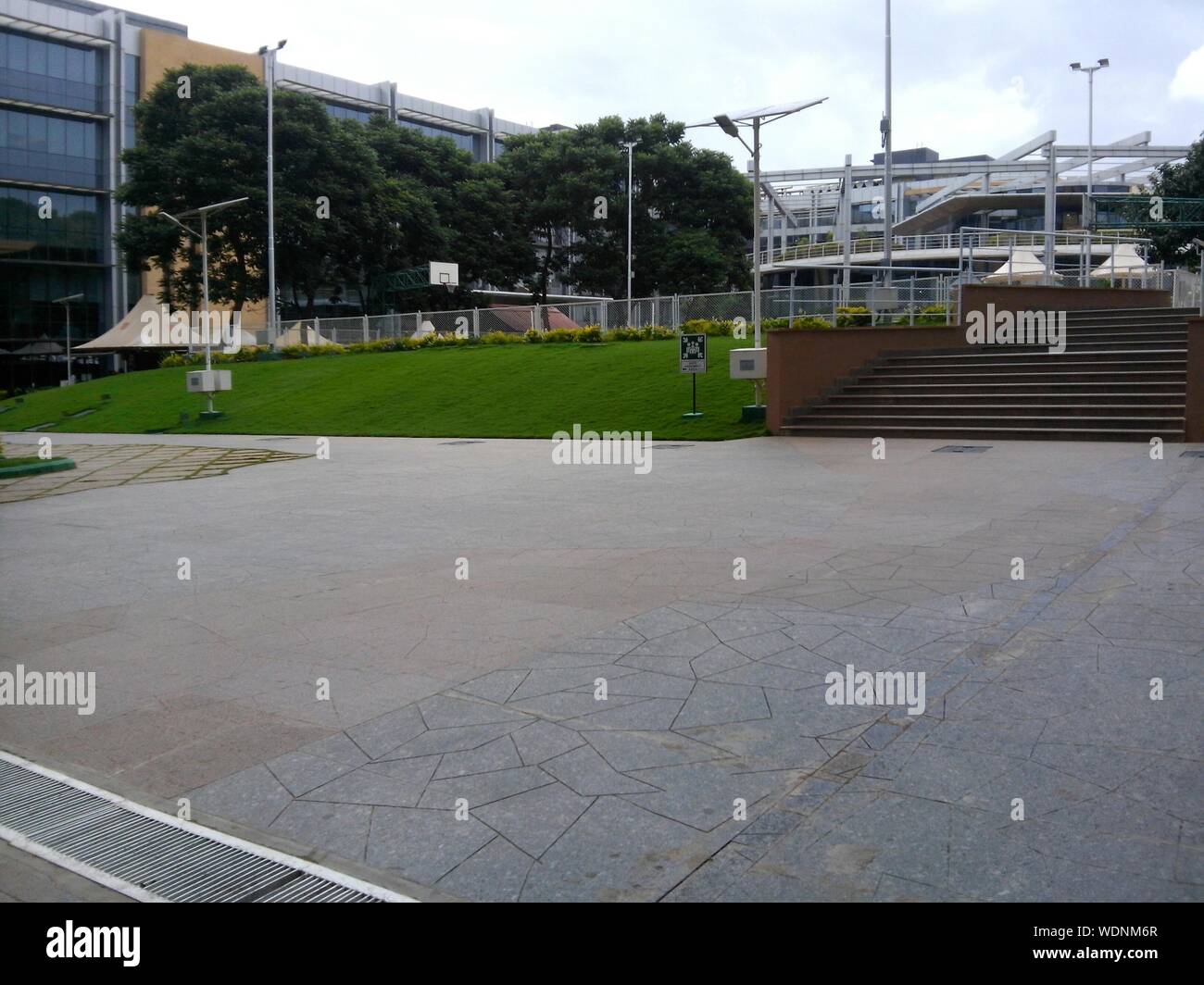 Footpath In Front Of Office Buildings Stock Photo - Alamy