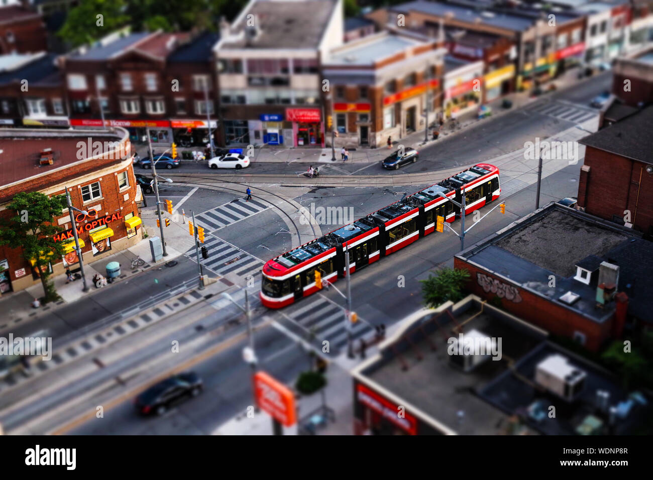 Toronto streetcar passing through intersection, tilt shift effect Stock ...
