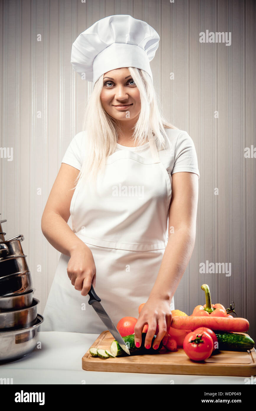 Woman chopping kitchen vegetables hi-res stock photography and images ...