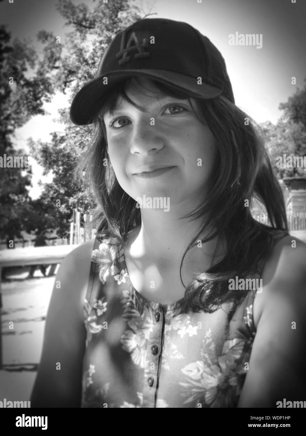 Portrait Of Girl Wearing Cap Outdoors Stock Photo - Alamy