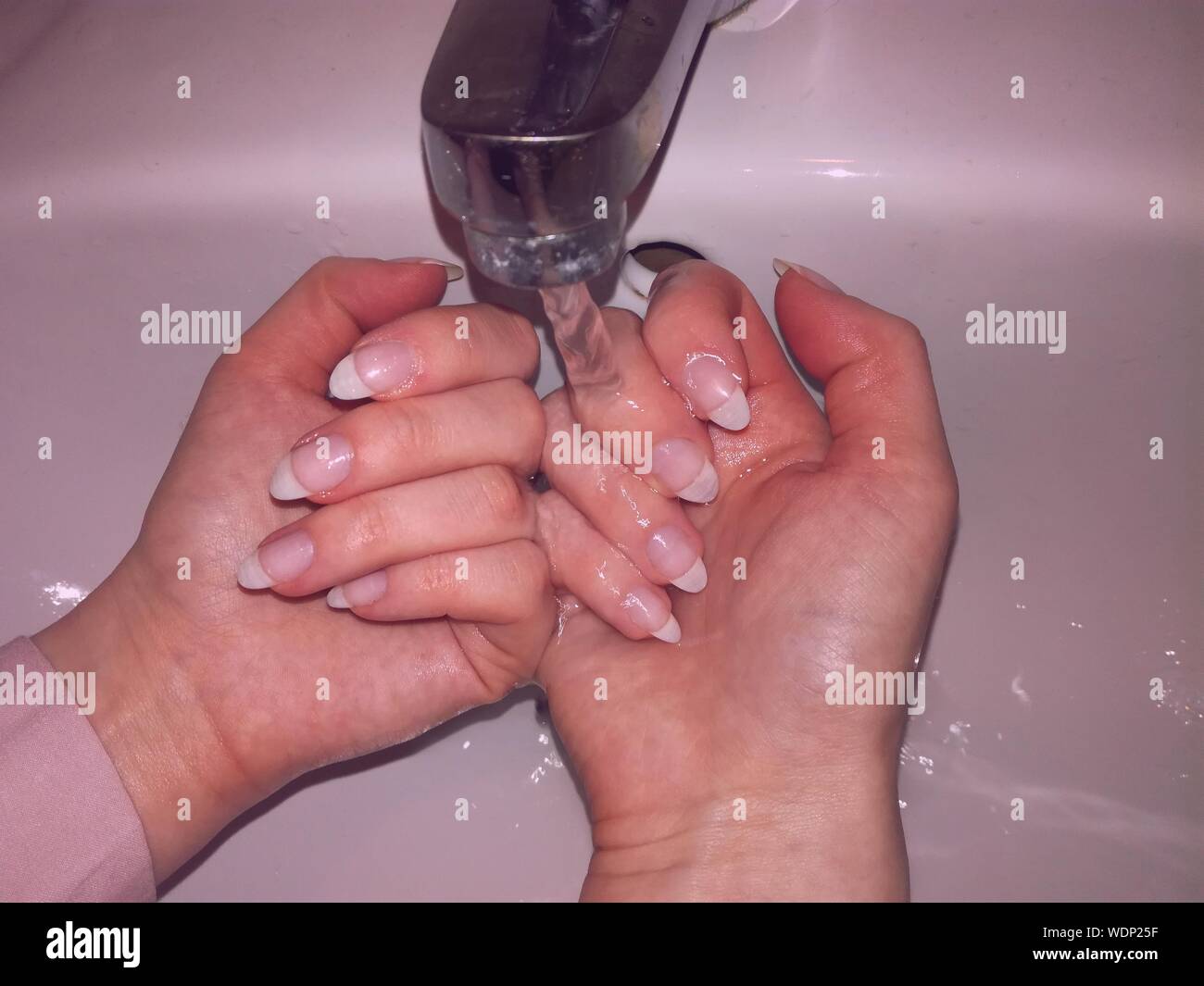 Washing up by hand hi-res stock photography and images - Alamy
