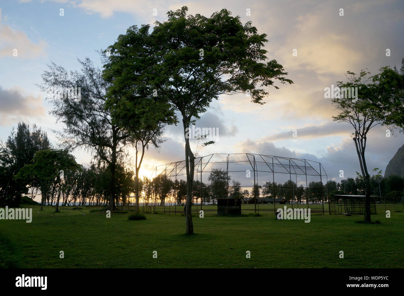 Sunrise over Grass field used for baseball and football at Waimanalo ...