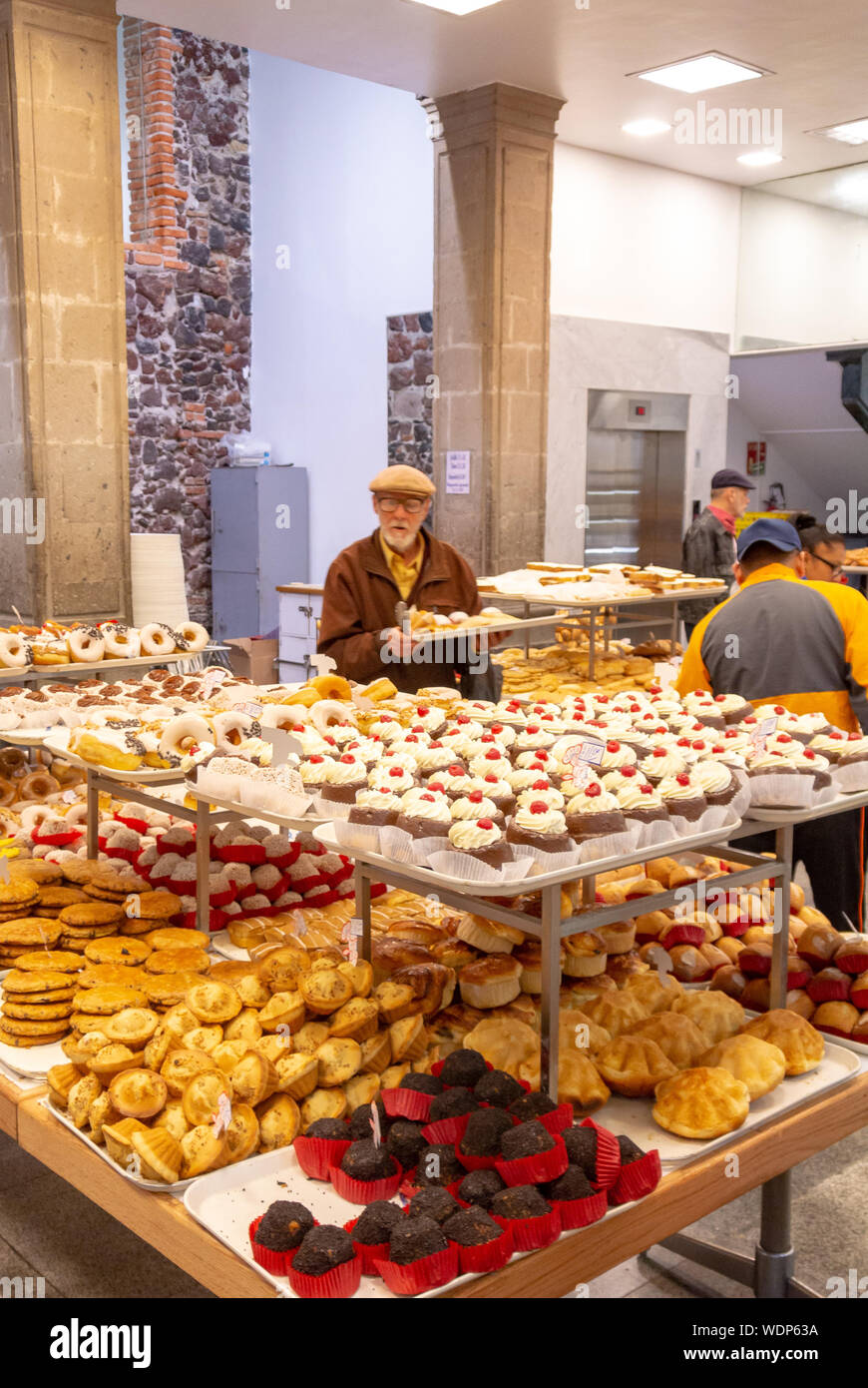 Local people buying pastries at PAS ELERIA IDEAL, a local bakery ...