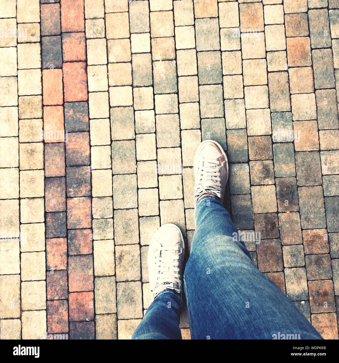 Man walking on pavement hi-res stock photography and images - Alamy