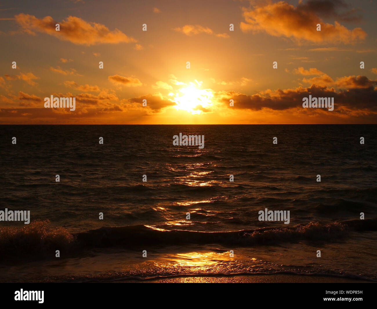 Early Morning Sunrise on Waimanalo Beach on Oahu, Hawaii over ocean ...