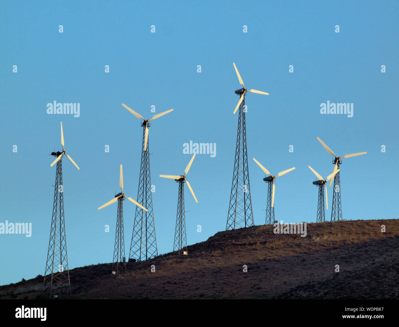 Modern Windmills spin on hillside on California Stock Photo - Alamy