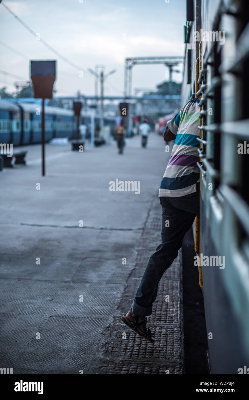 Man entering train hi-res stock photography and images - Alamy