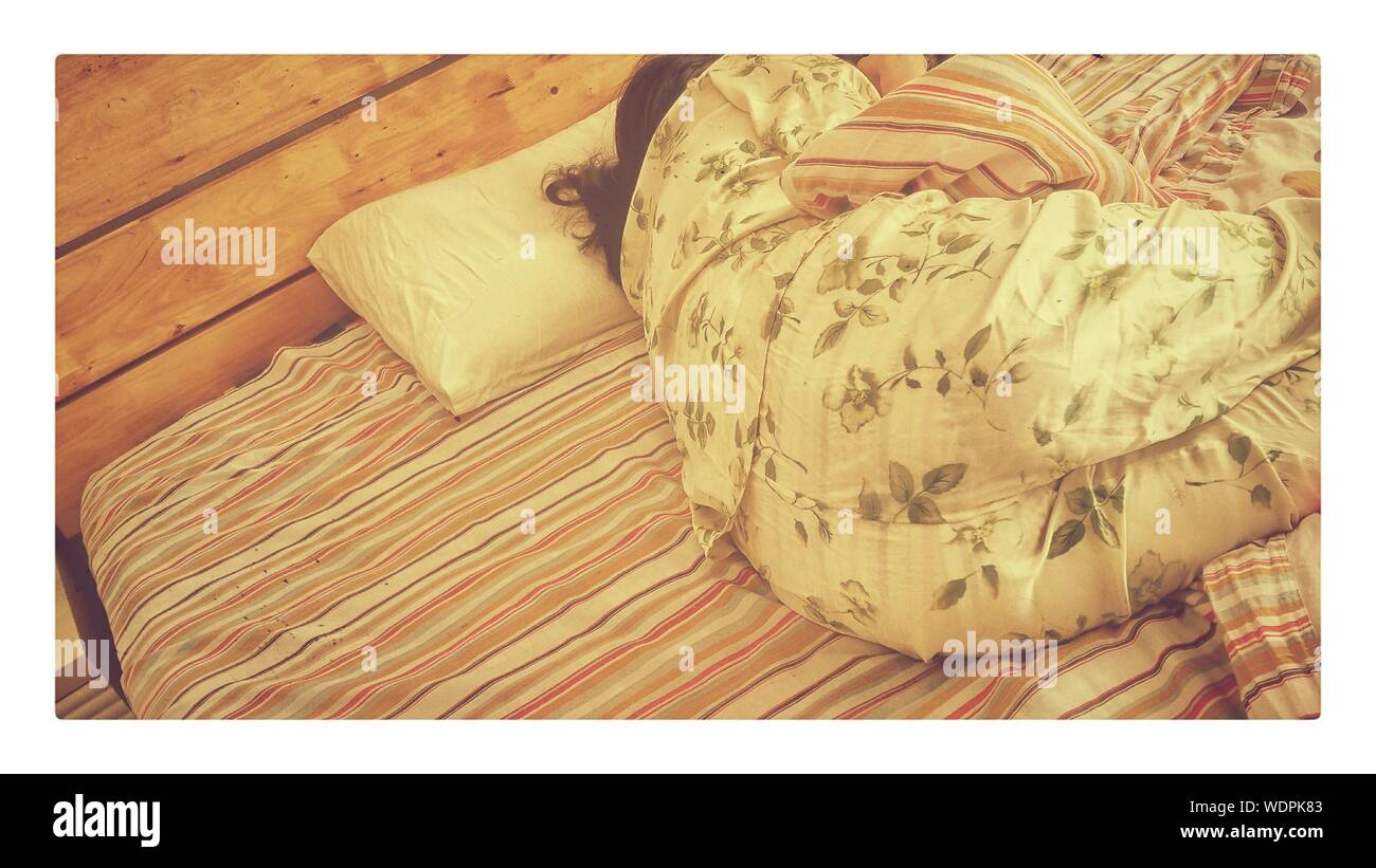 Person sleeping in bed side view hi-res stock photography and images ...